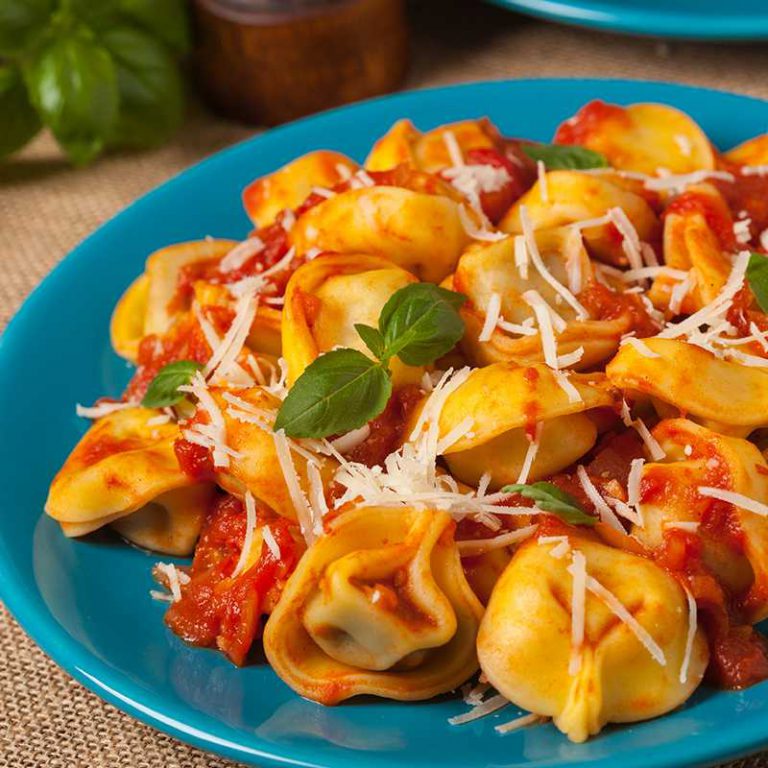 Tortelloni with four cheese in creamy sun-dried tomato and basil sauce ...